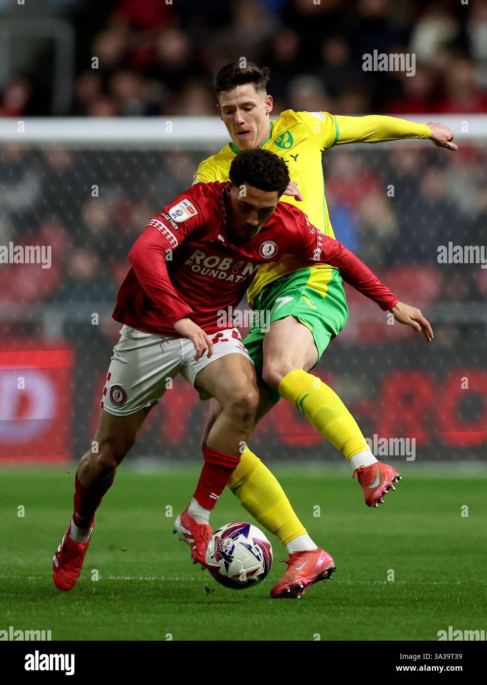 Bristol City's Haydon Roberts (left) and Norwich City's Ante Crnac ...