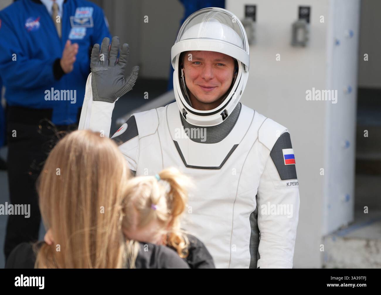 SpaceX NASA Crew-10 mission Roscosmos Cosmonaut Kirill Peskov waves as ...