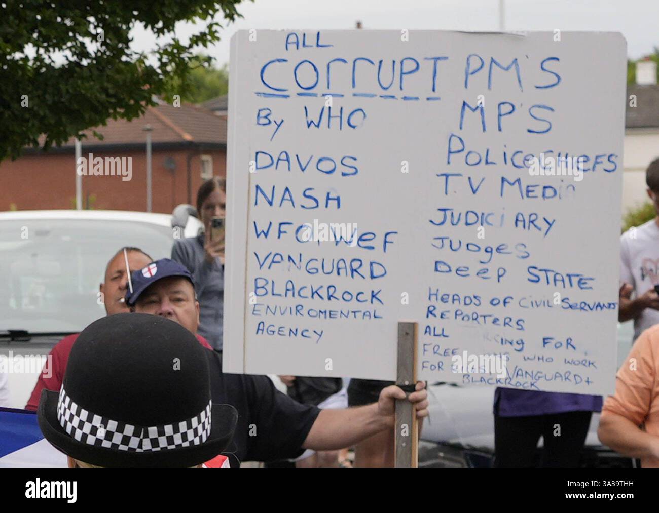 File photo dated 4/8/2024 of Peter Lynch holding a sign outside the ...