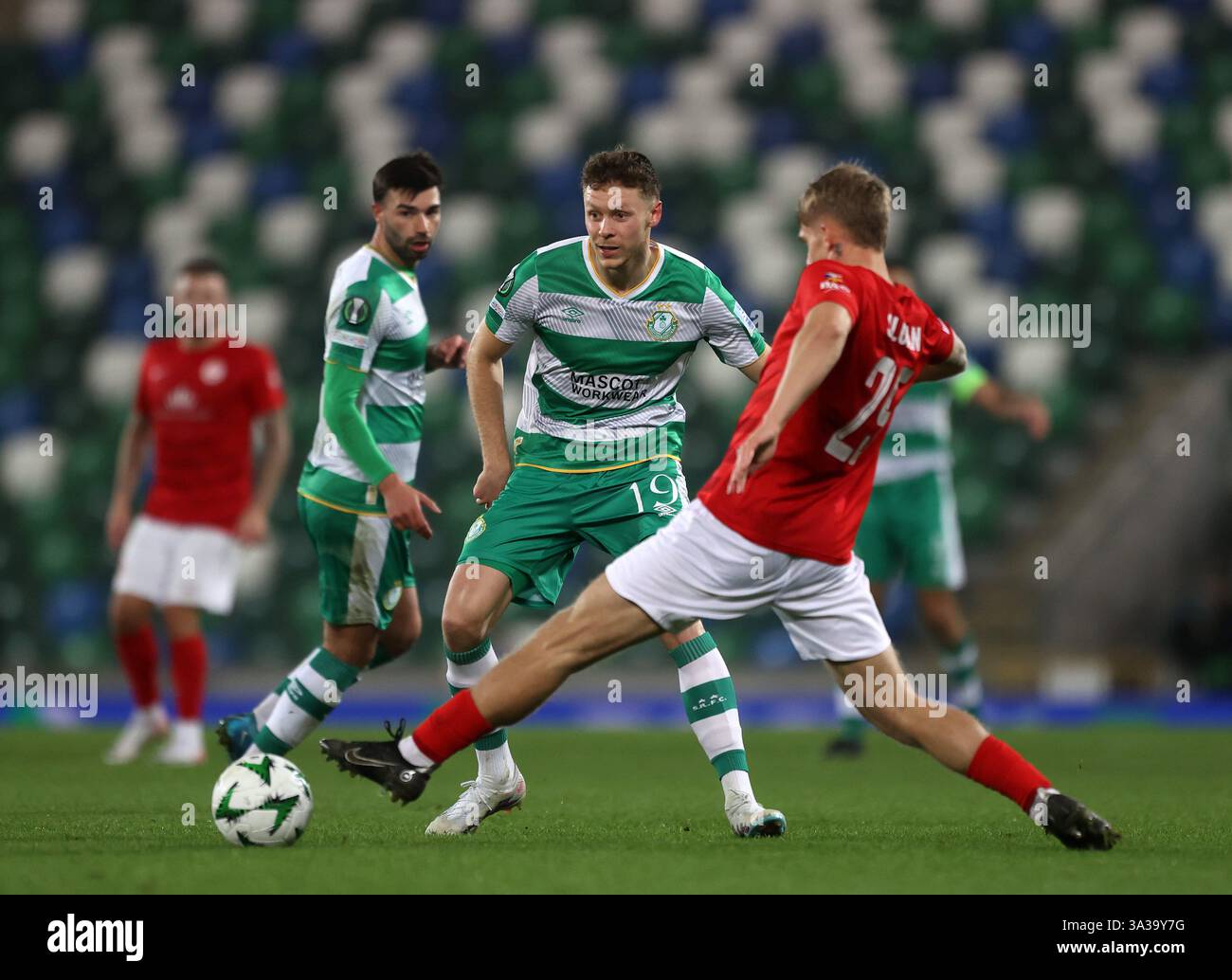 Shamrock Rovers' Markus Poom in action against Larne’s Dylan Sloan ...