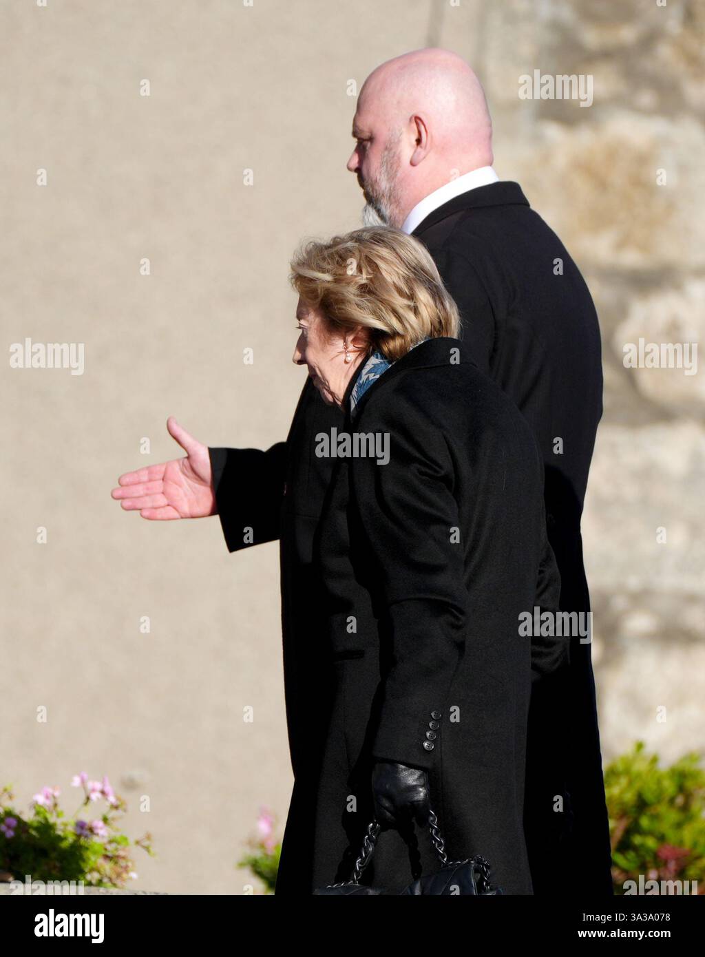 Pall bearers with the coffin, draped in a Saltire flag, arrive for the ...