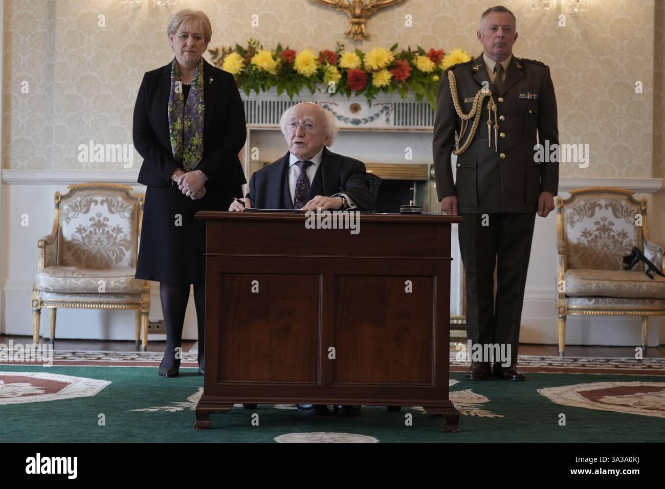 President Michael D Higgins speaks after signing a Presidential pardon ...