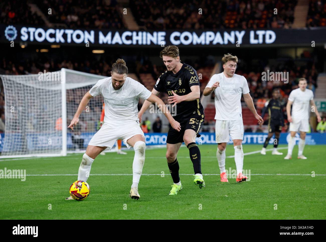 Middlesbrough's Luke Ayling (left) and Coventry City's Jack Rudoni ...