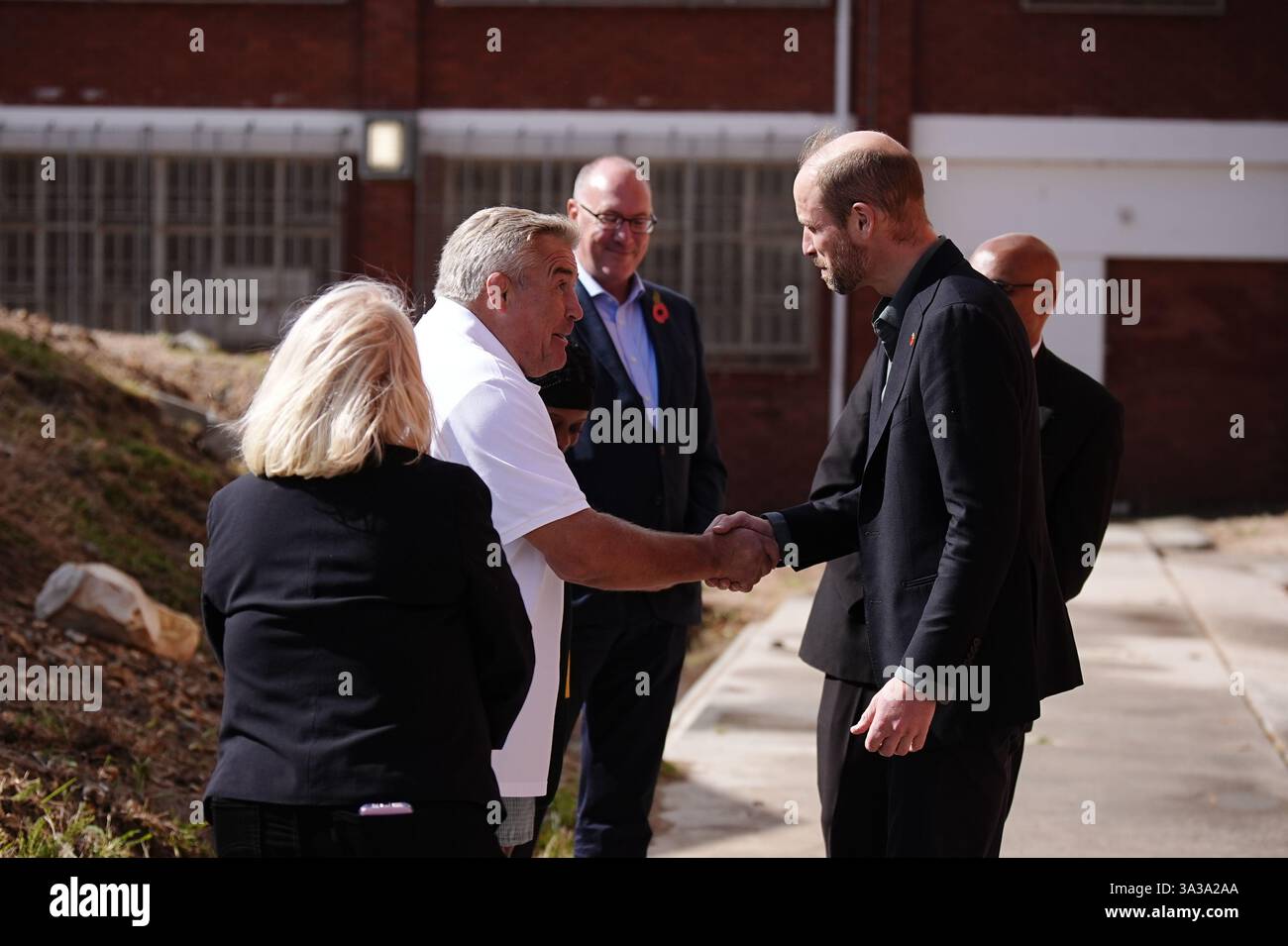 The Prince of Wales shakes hands with former England rugby player Jason ...