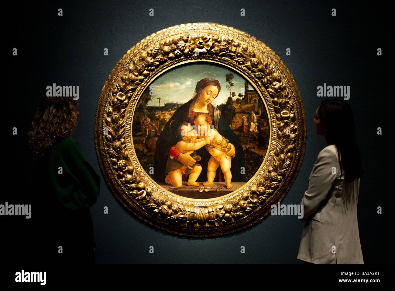 Gallery assistants with The Virgin and Child with the Infant St John ...