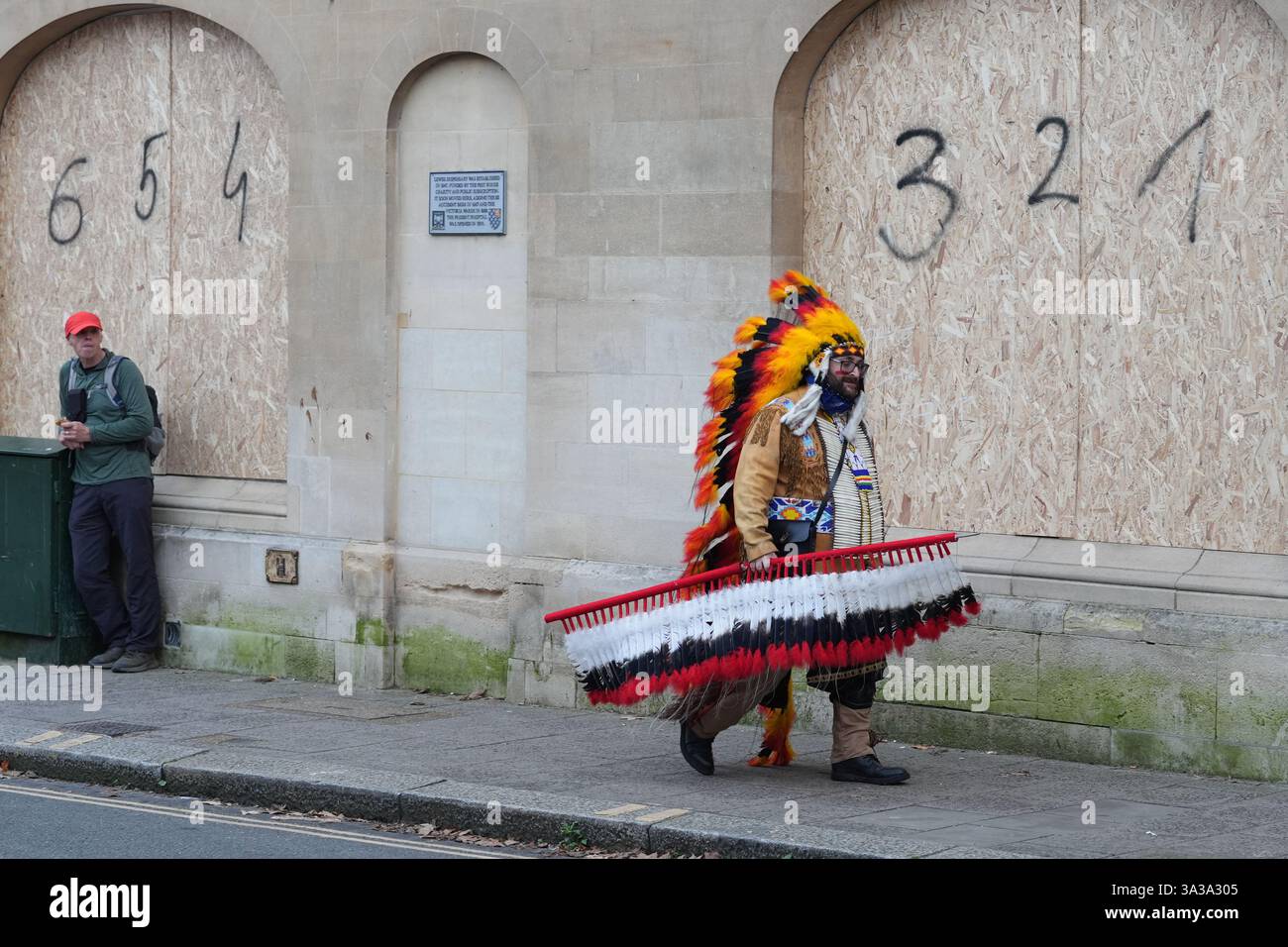People during preparations for the parade through the town of Lewes in ...