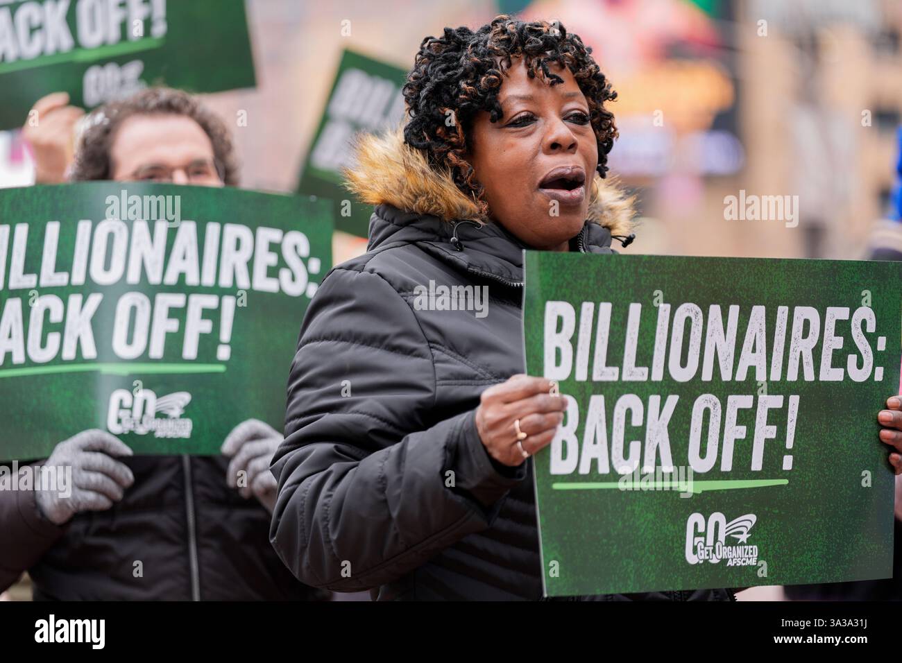Demonstrators gather outside of the Edward A. Garmatz United States ...