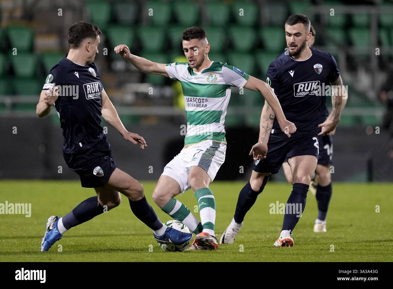 Shamrock Rovers' Dylan Watts (centre) and The New Saints' Daniel Davies ...
