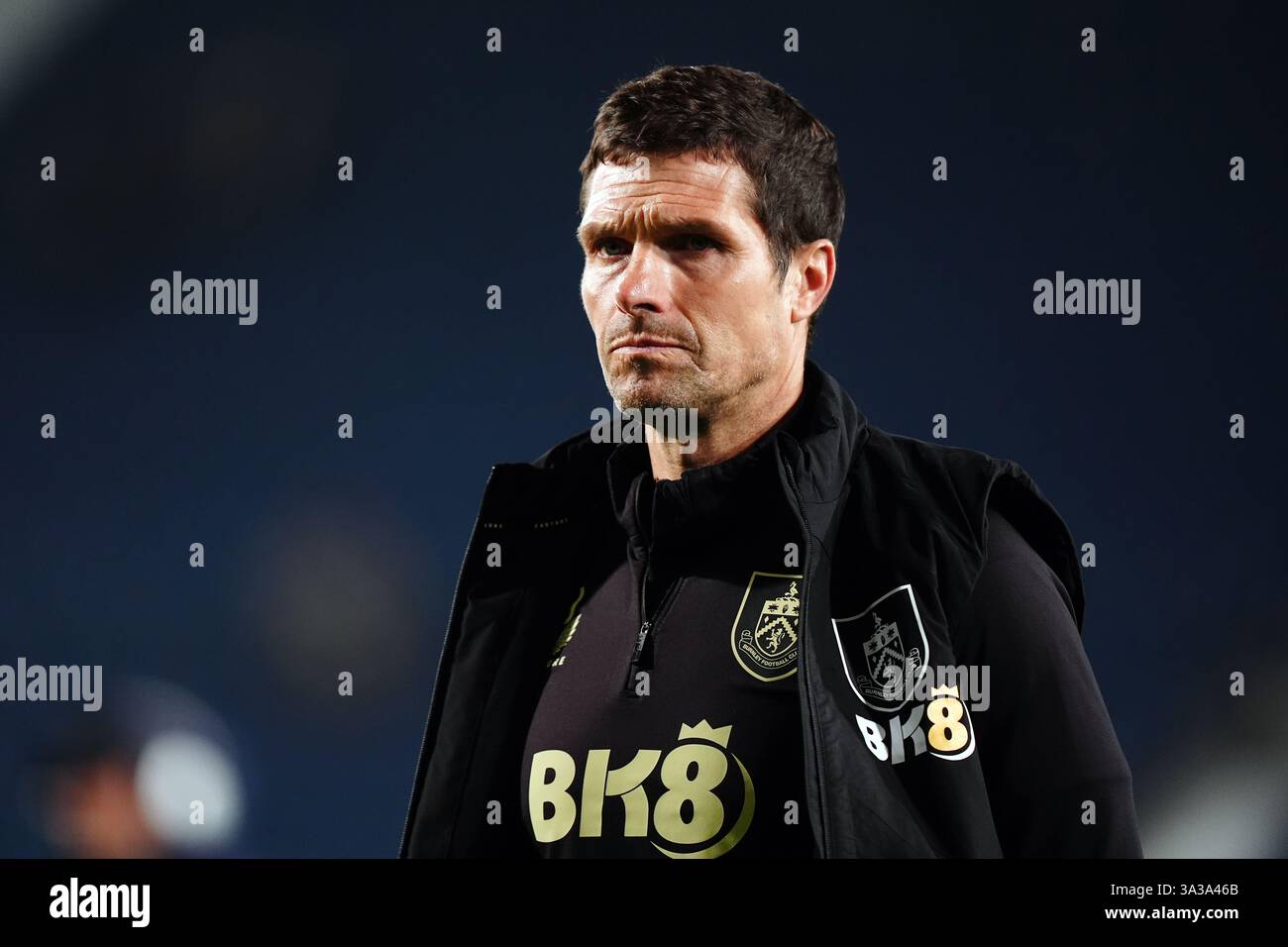 Burnley coach Mike Jackson inspects the pitch before the Sky Bet ...