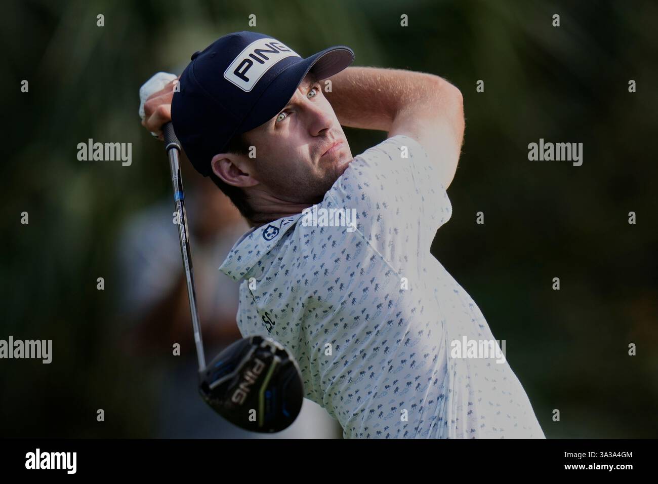 Alex Smalley watches his tee shot on the 15th hole during the second ...