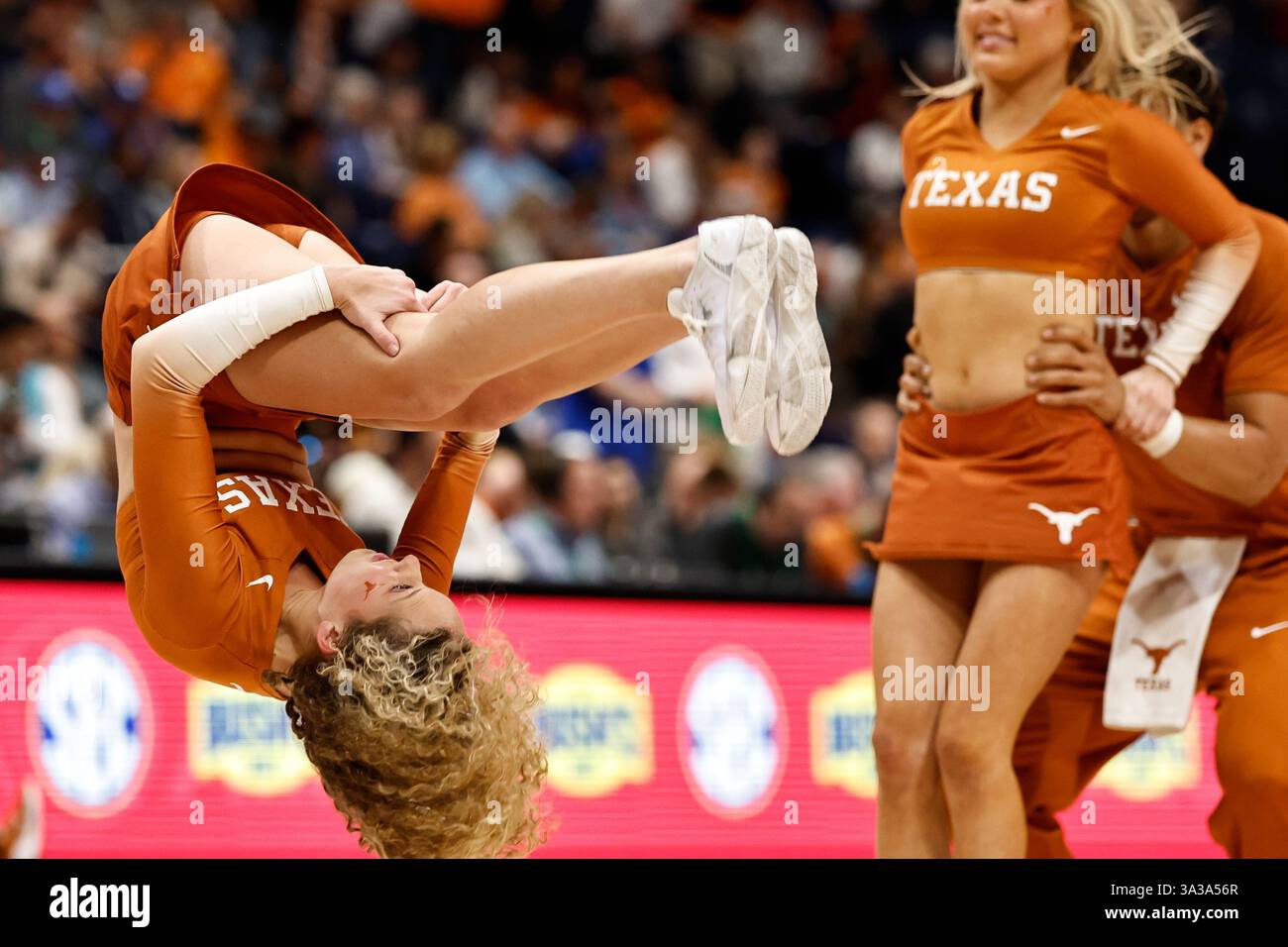 Texas cheerleaders perform during the first half of an NCAA college ...