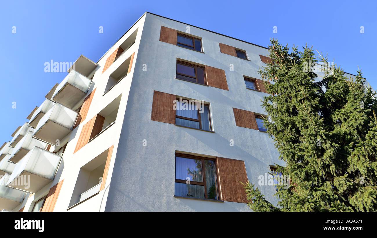 Apartment building with symmetrical modern architecture in the city ...