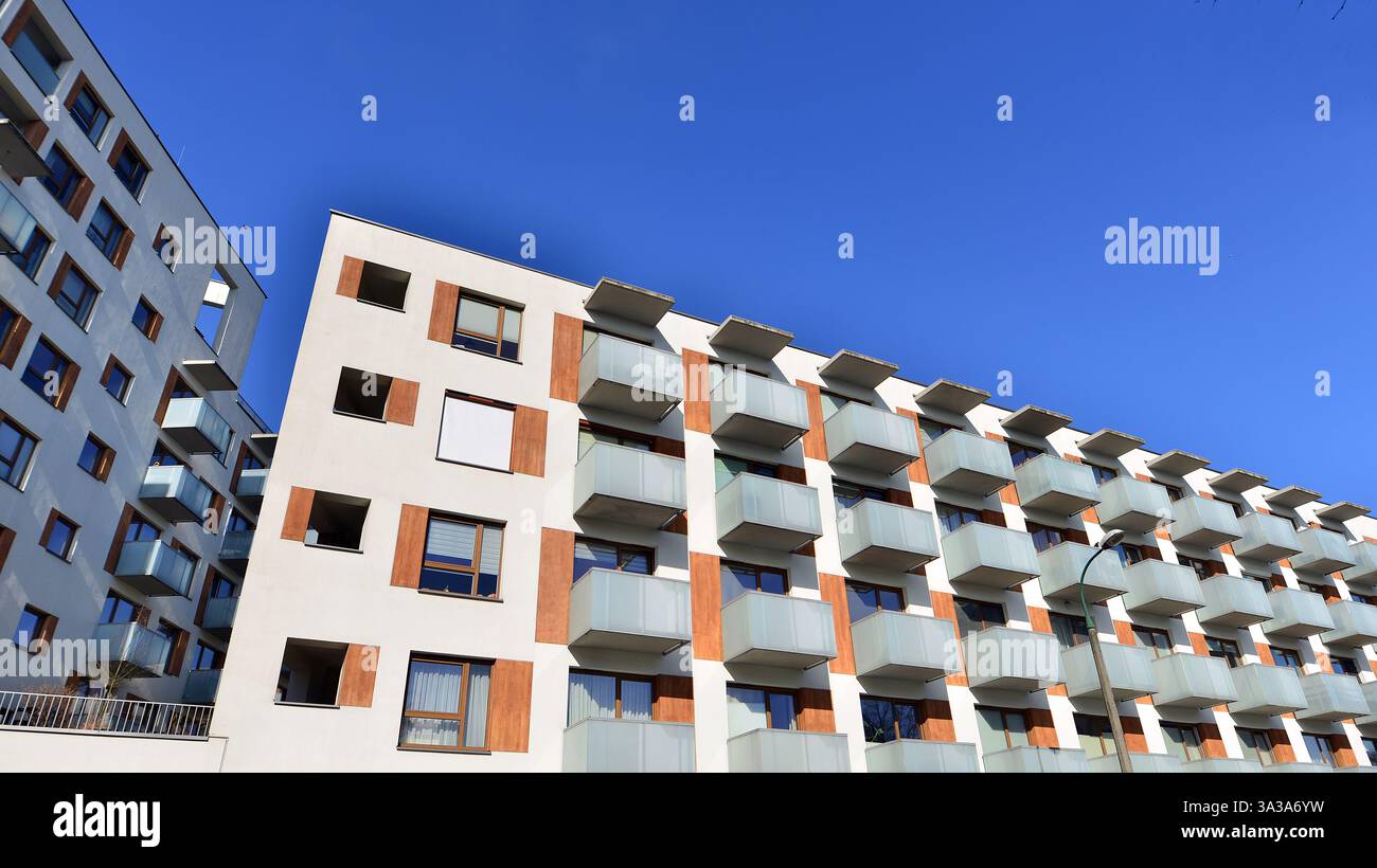 Apartment building with symmetrical modern architecture in the city ...