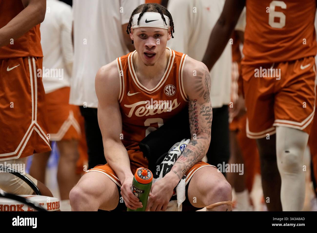 Texas guard Chendall Weaver (2) watches play against the Tennessee ...
