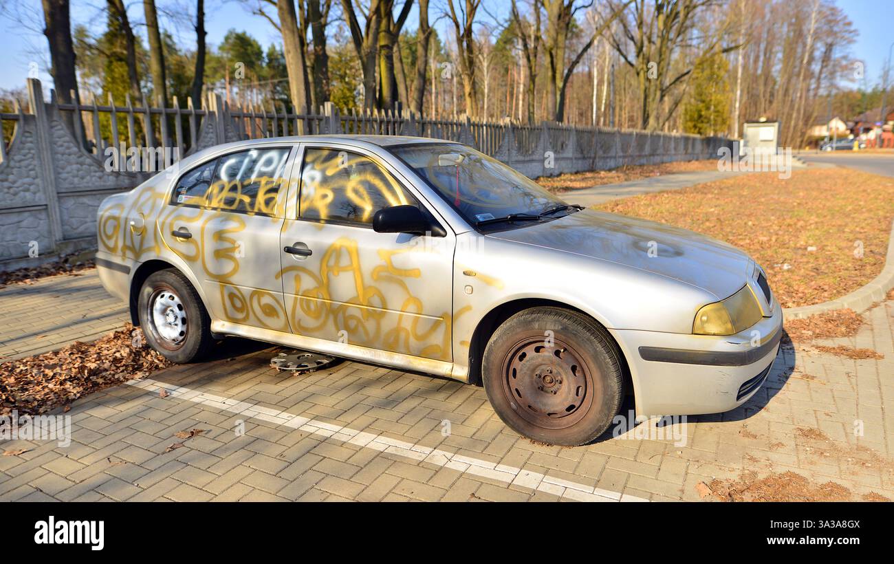 Warsaw, Poland. 6 March 2025. Vandalized silver car vehicle on street ...