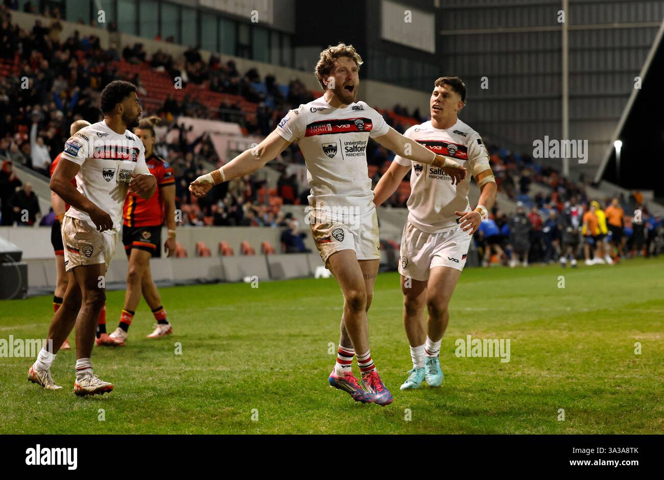 Salford Red Devils' Ethan Ryan celebrates scoring a try during the ...