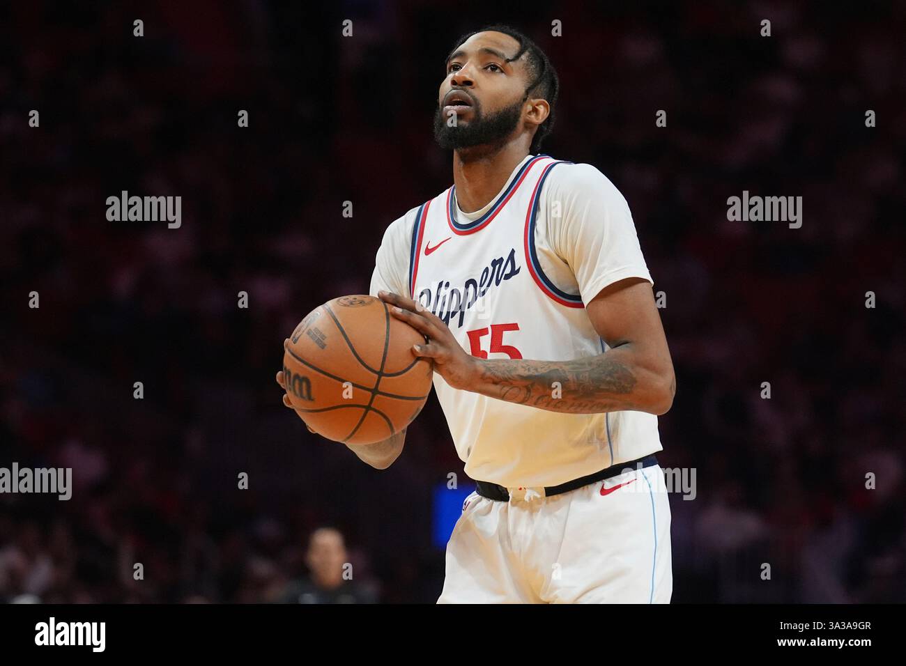 LA Clippers forward Derrick Jones Jr. (55) aims from the free throw ...
