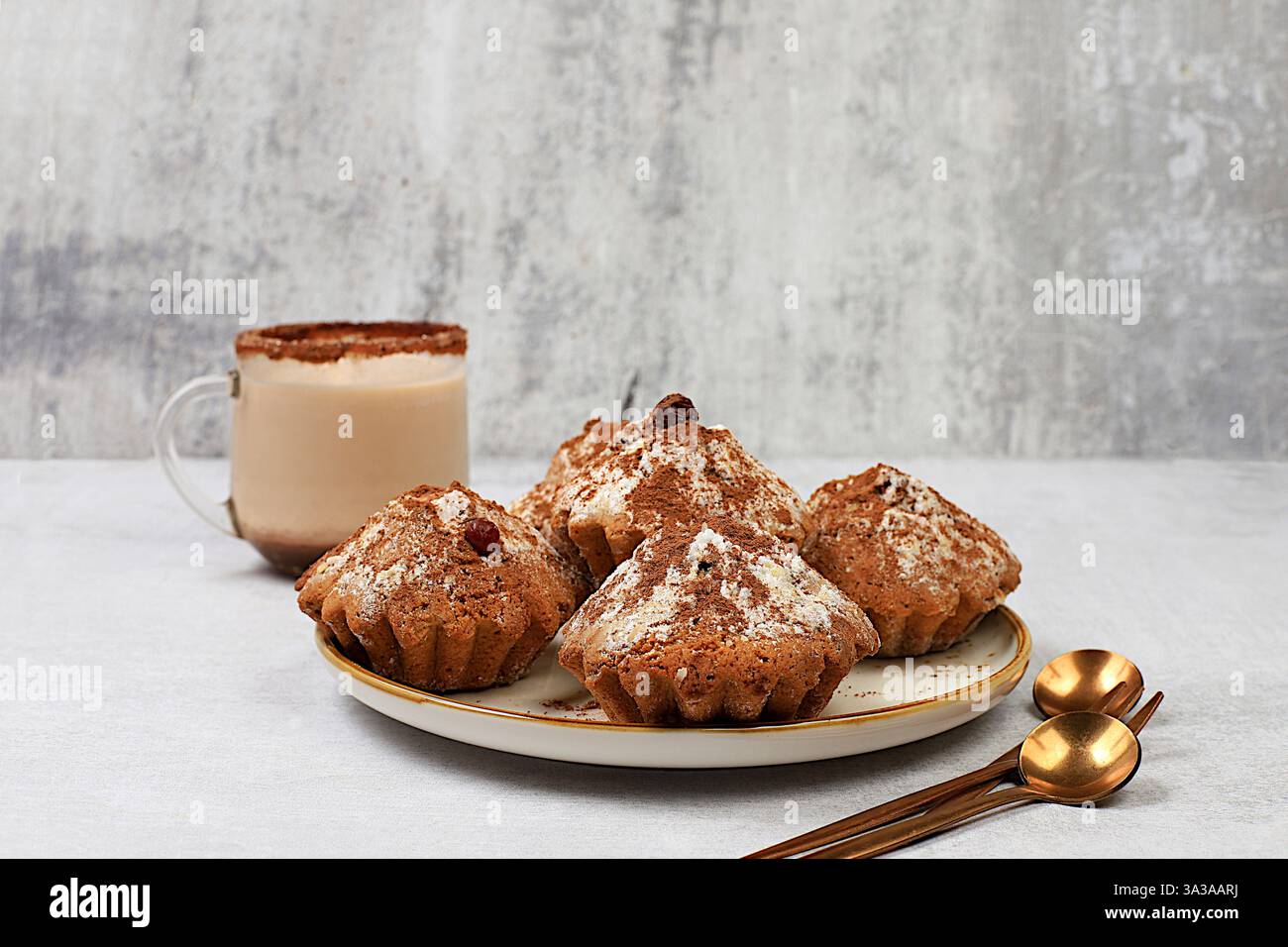 Delicious chocolate muffins with cranberries and milk drink eggnog with ...