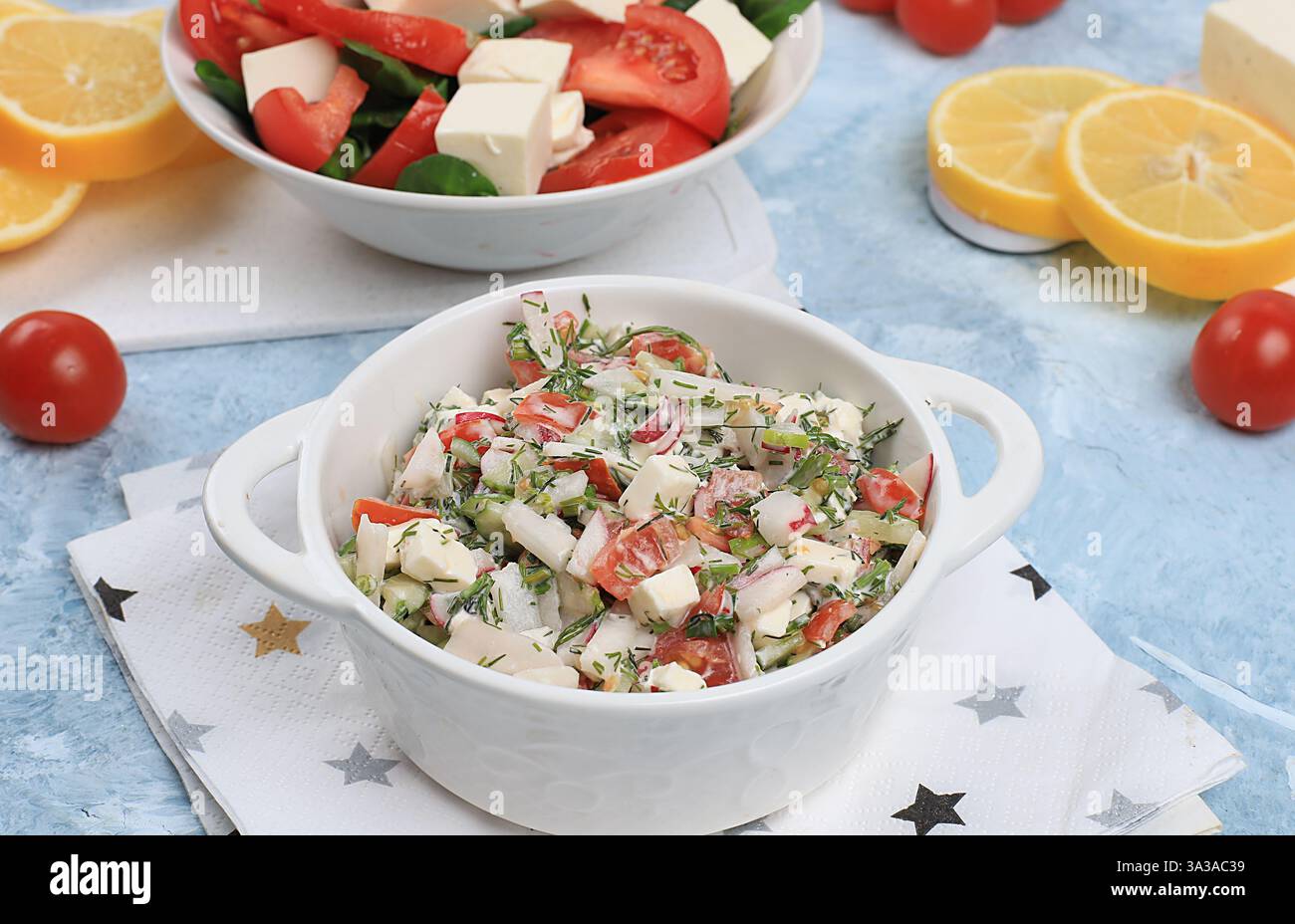 Vegetable salad with mozzarella cheese, cherry tomatoes and fresh ...