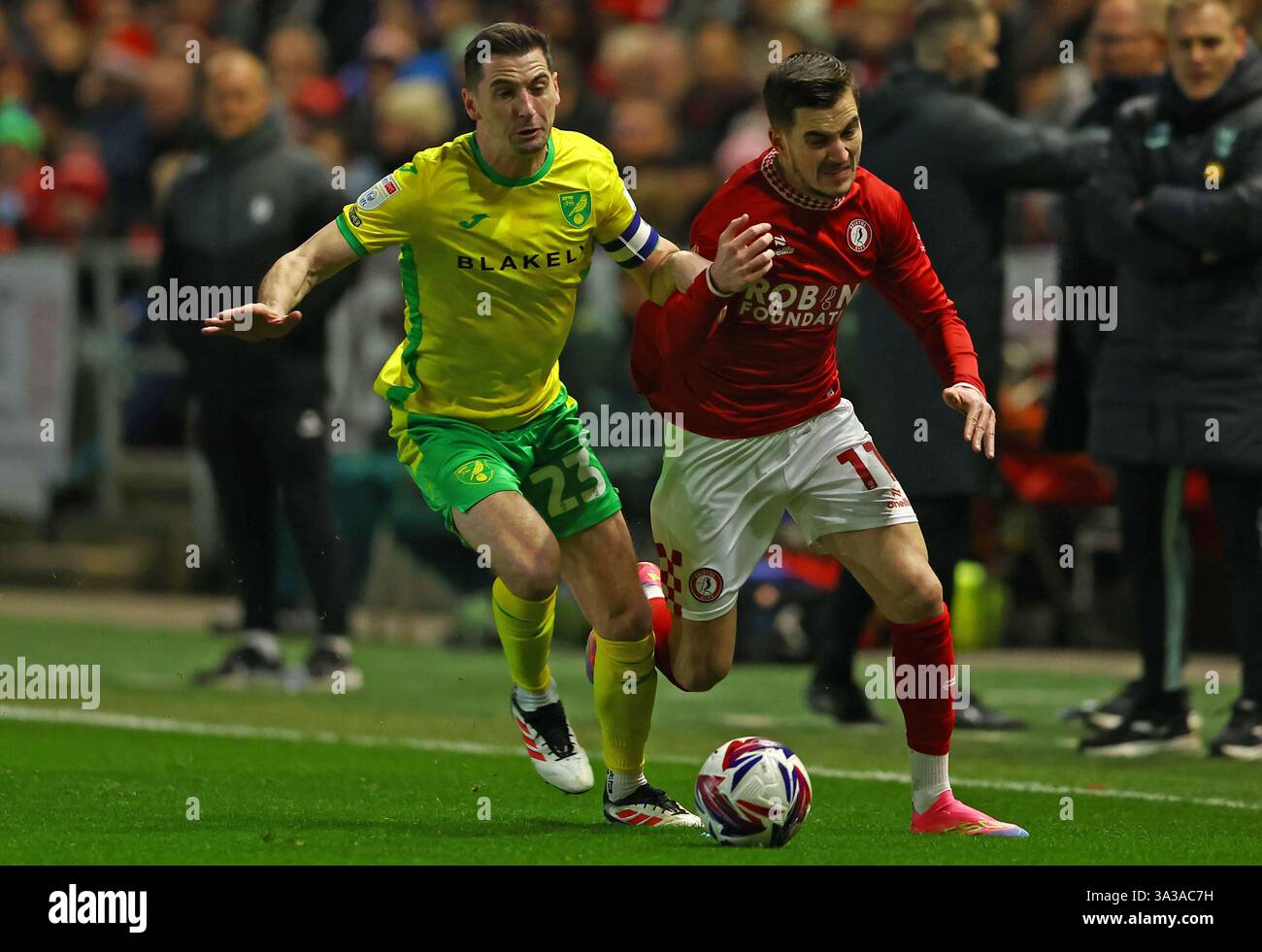 Bristol, UK. 14th Mar, 2025. Anis Mehmeti of Bristol City is challenged ...