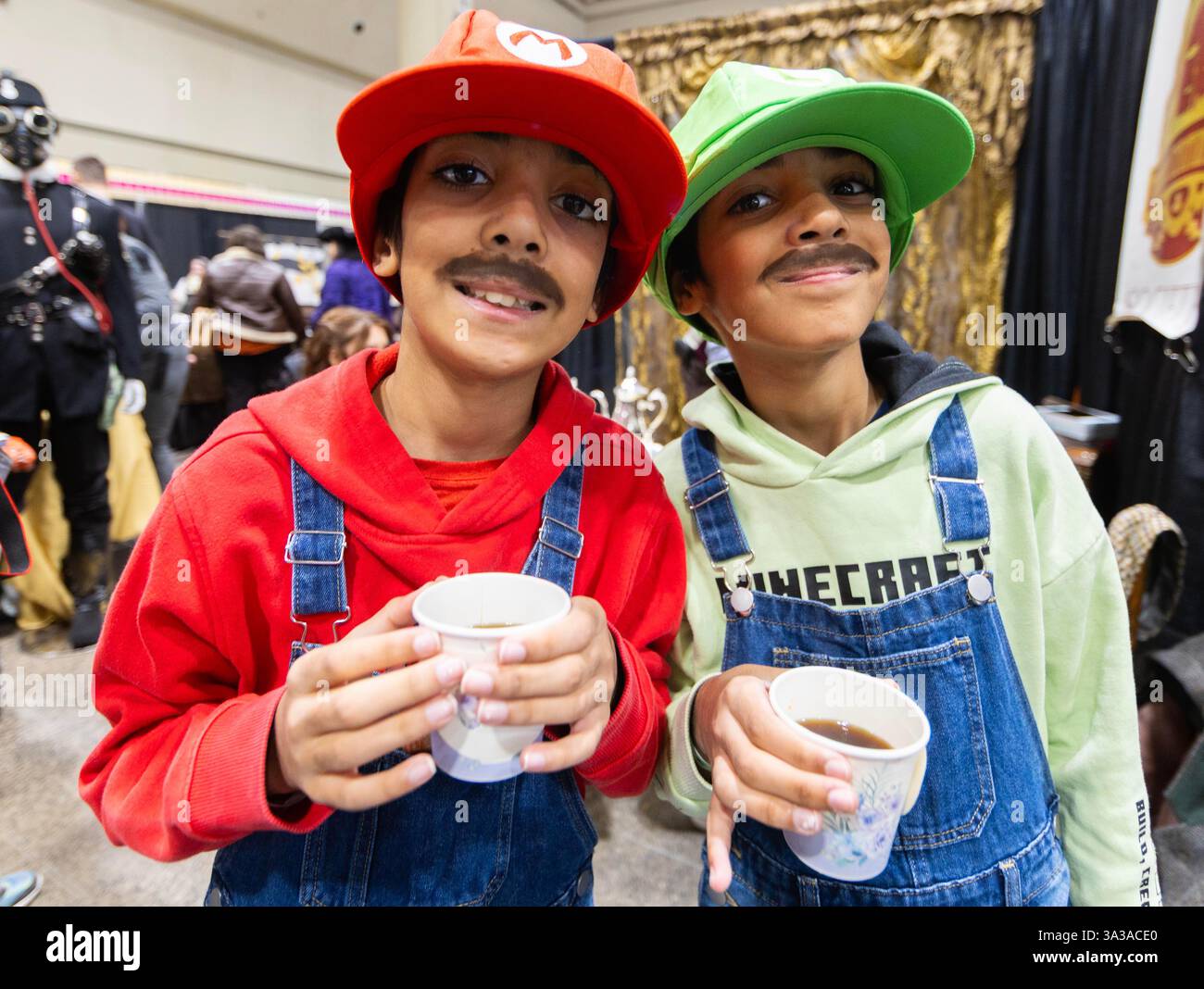 Toronto, Canada. 14th Mar, 2025. Cosplayers pose for photos at the 2025 ...