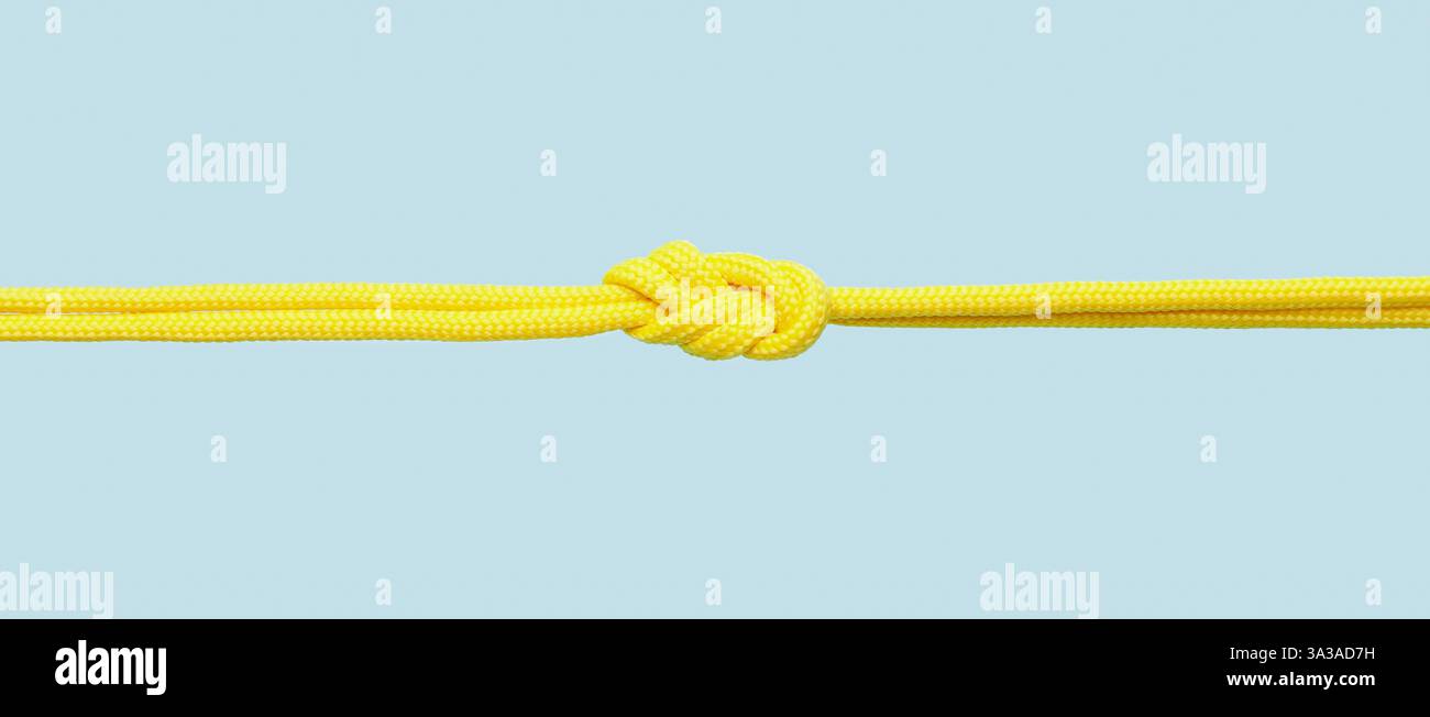 Rope with knot on blue background. Concept of connection Stock Photo ...