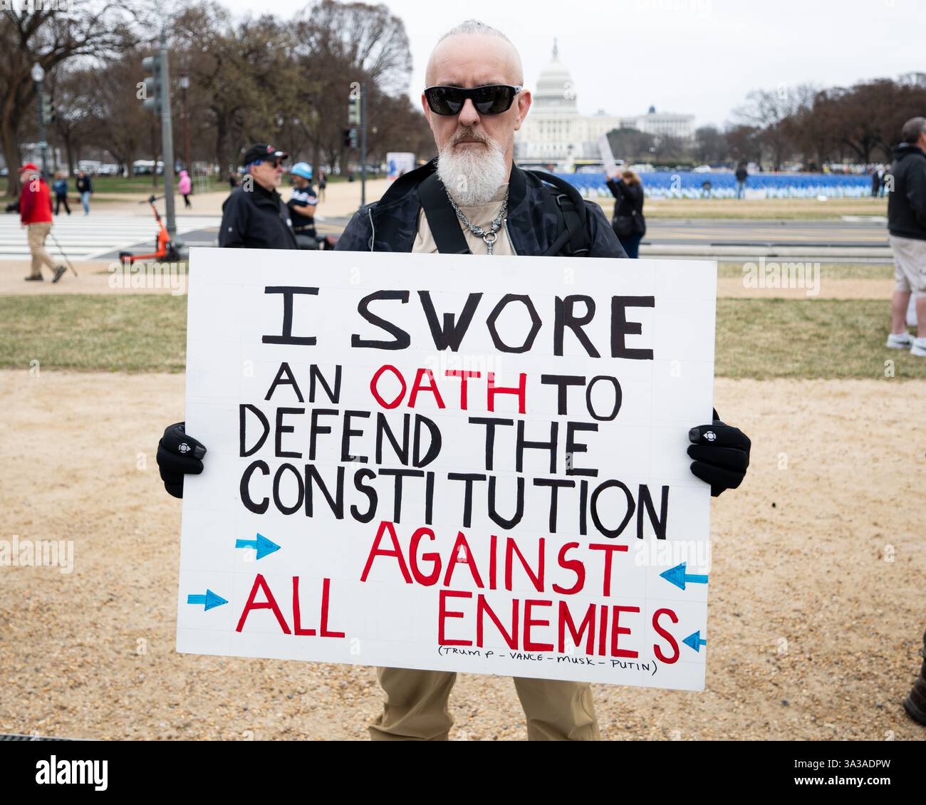Washington, United States. 14th Mar, 2025. Person with a sign saying "I ...