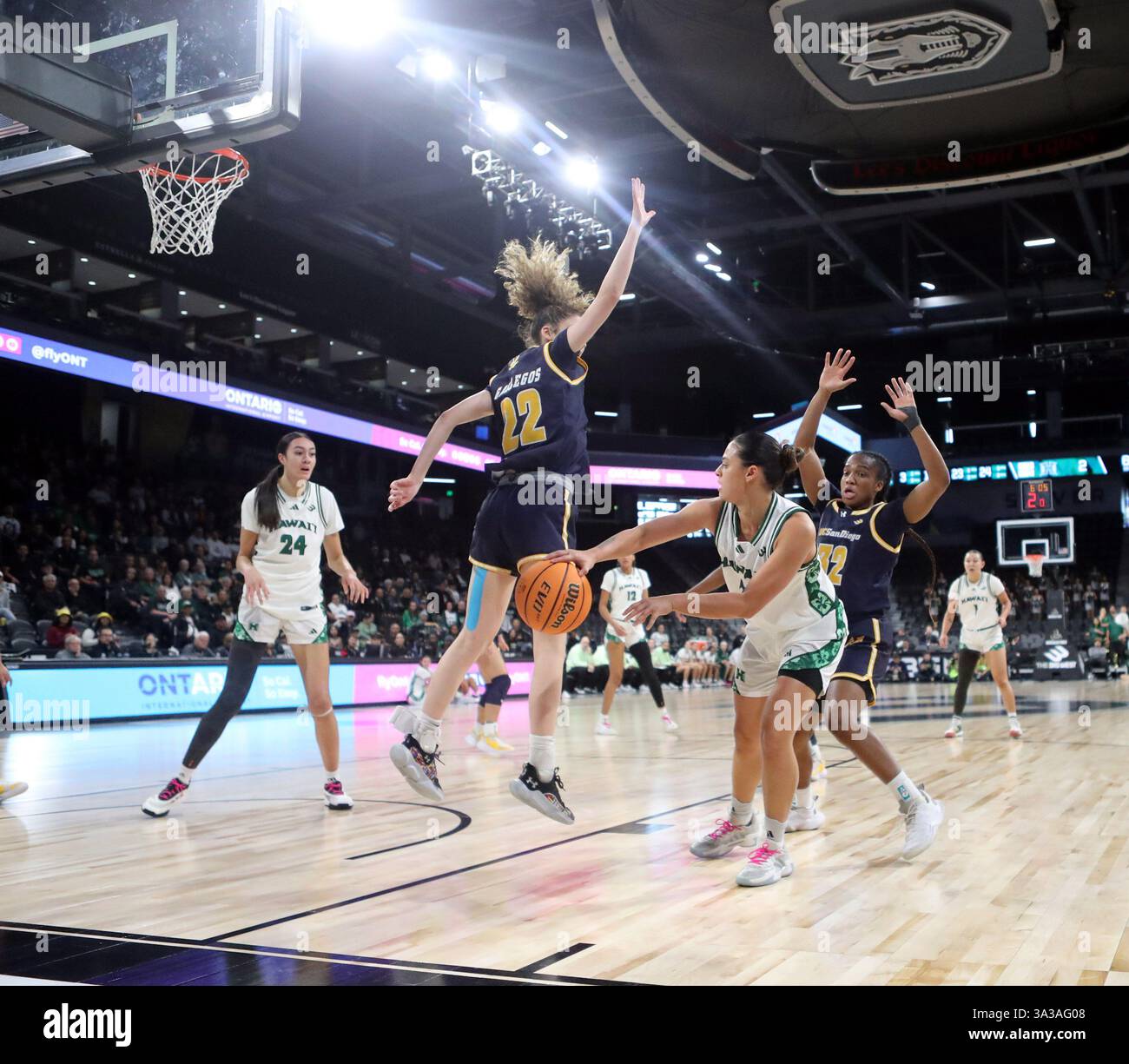 March 14, 2025 - Hawai'i Rainbow Wahine guard Lily Wahinekapu #3 passes ...