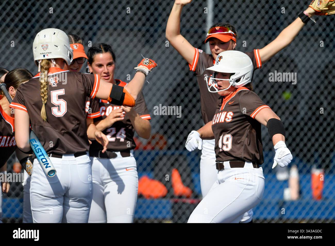 Bowling Green's Kendall Mathews, right, celebrates with teammates after ...