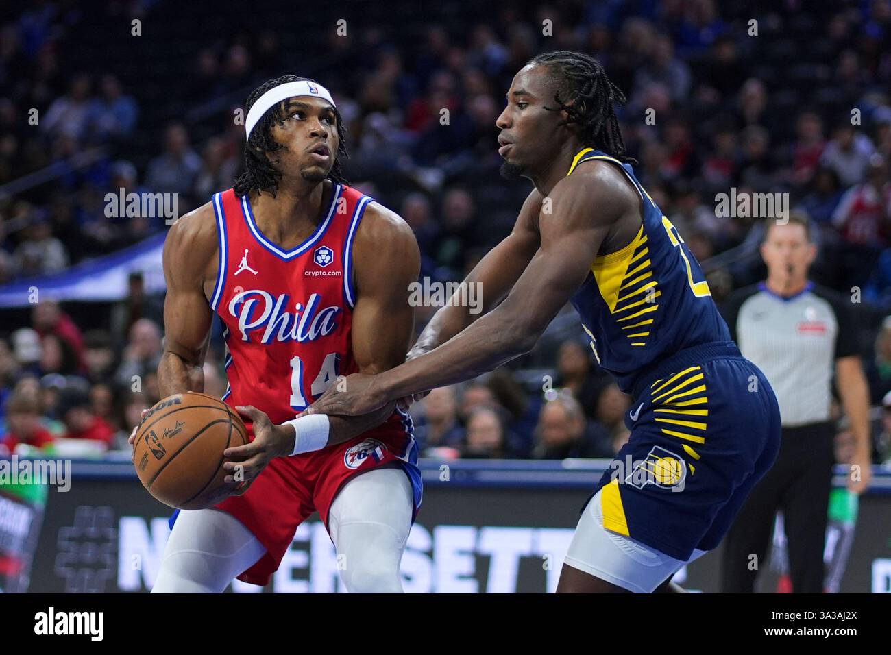 Philadelphia 76ers' Ricky Council IV, left, tries to get past Indiana ...