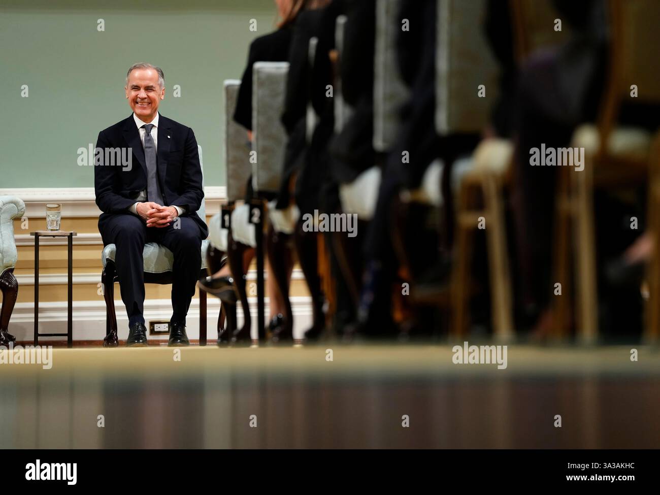 Ottawa, Canada. 14th Mar, 2025. Prime Minister Mark Carney looks on ...
