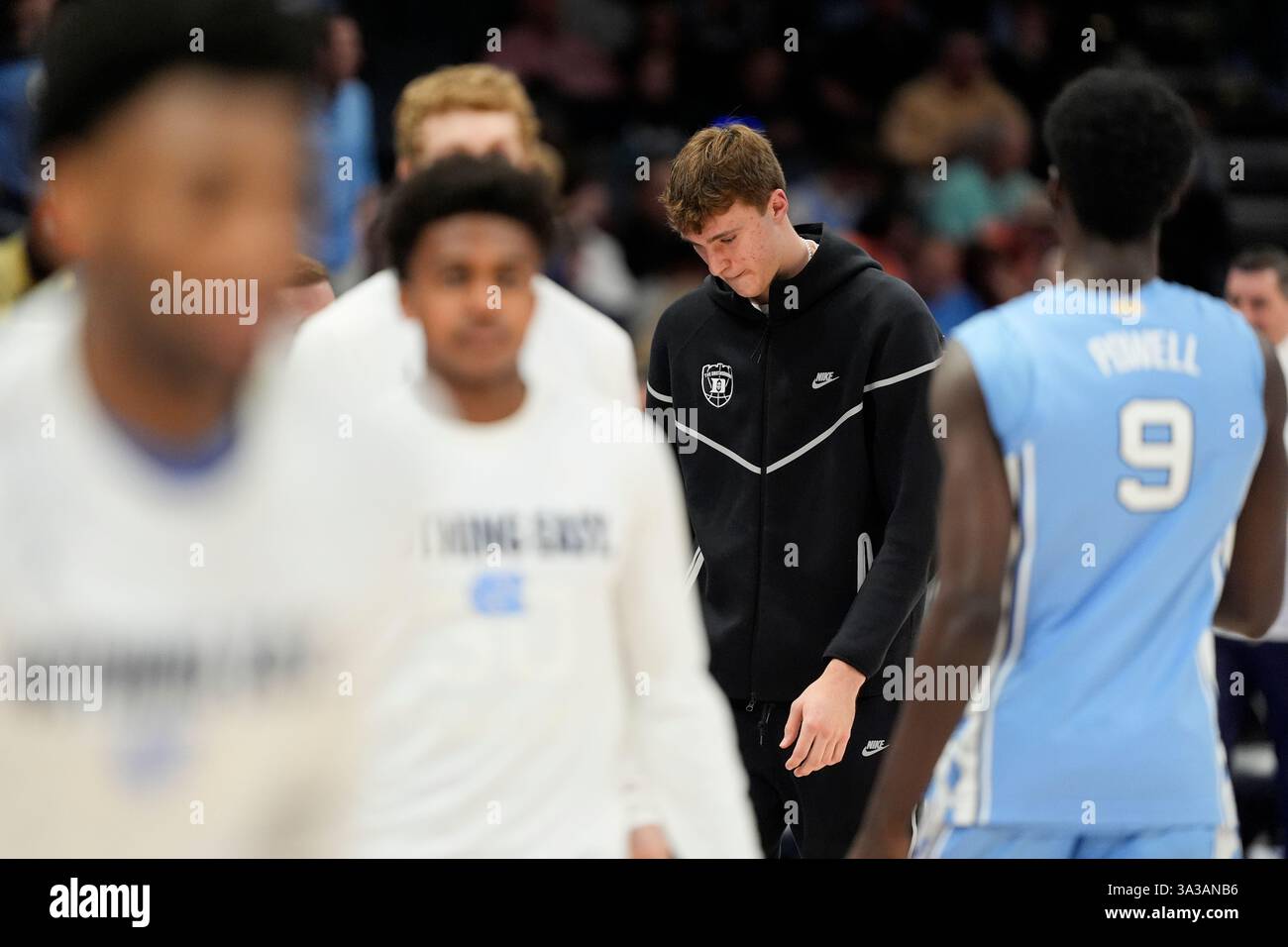 Duke forward Cooper Flagg walks to the bench during the first half of ...