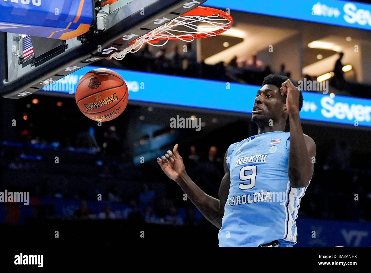 North Carolina guard Drake Powell dunks against Duke during the first ...
