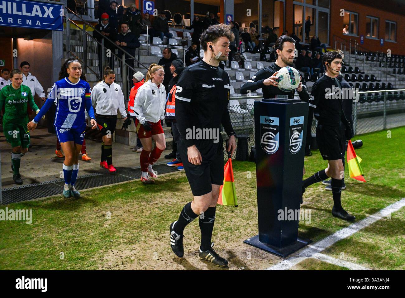referee Jeroen Platteau taking the match ball pictured before a female ...
