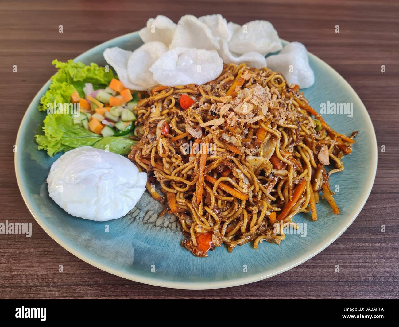 Fried Noodles or Mie Goreng, Indonesian food Stock Photo - Alamy