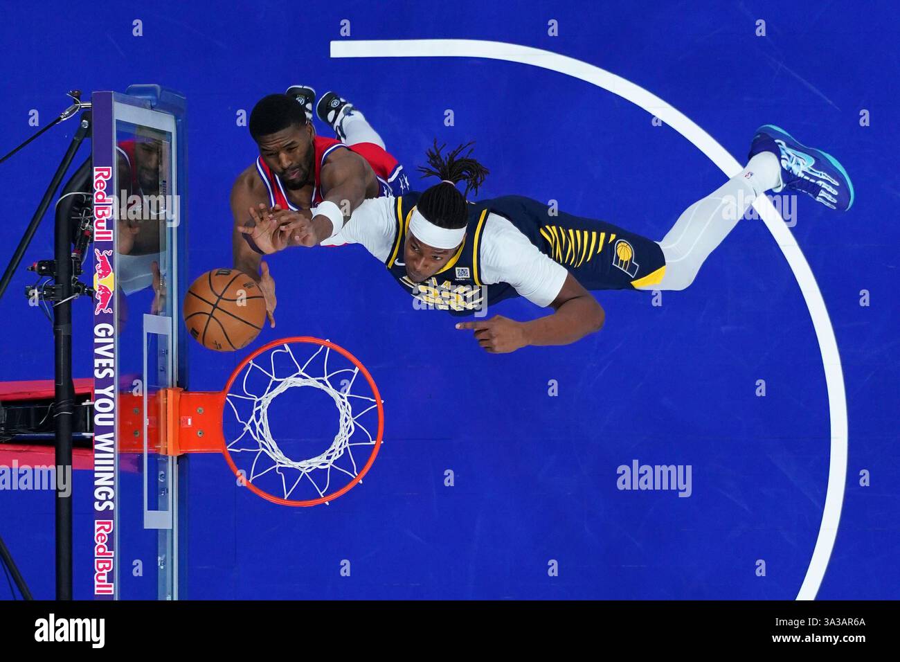 Indiana Pacers' Myles Turner, right, goes up for a shot against ...