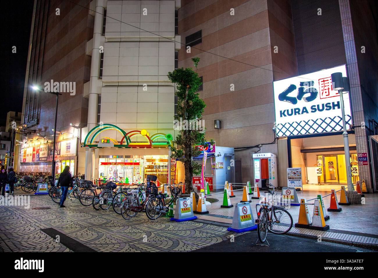Rokku Broadway at night in Asakusa, Tokyo, Japan. It is famous as one ...