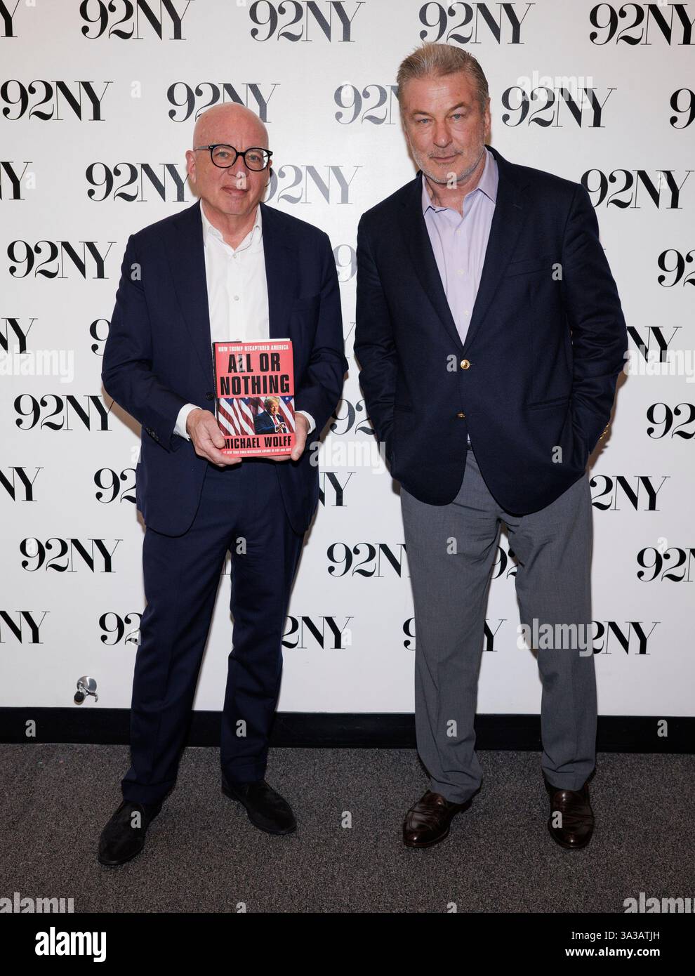 Author Michael Wolff poses with moderator Alec Baldwin before ...