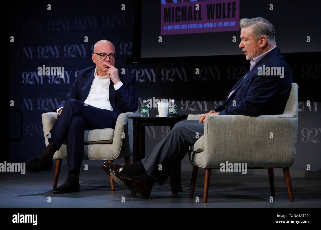 Author Michael Wolff, left, and Alec Baldwin discuss Wolff's book "All ...