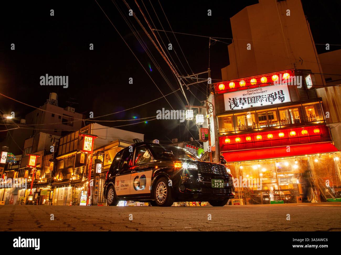 A Tokyo taxi cab with bars and restaurants in Hoppy-dori or Hoppy ...