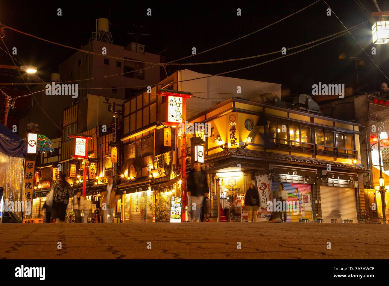 Traditional bars and restaurants at night at Hoppy Street in Asakusa ...