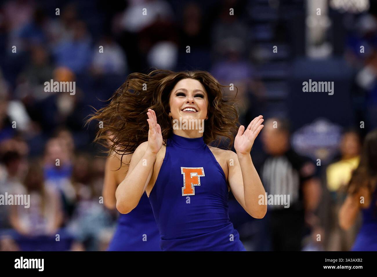 Florida cheerleaders perform during the first half of an NCAA college ...