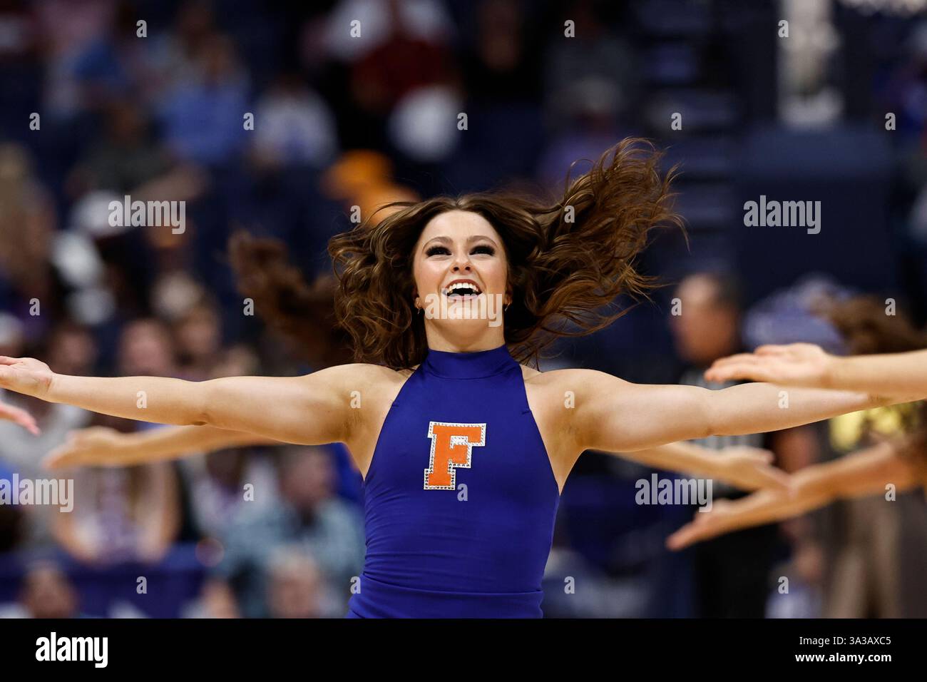 Florida cheerleaders perform during the first half of an NCAA college ...