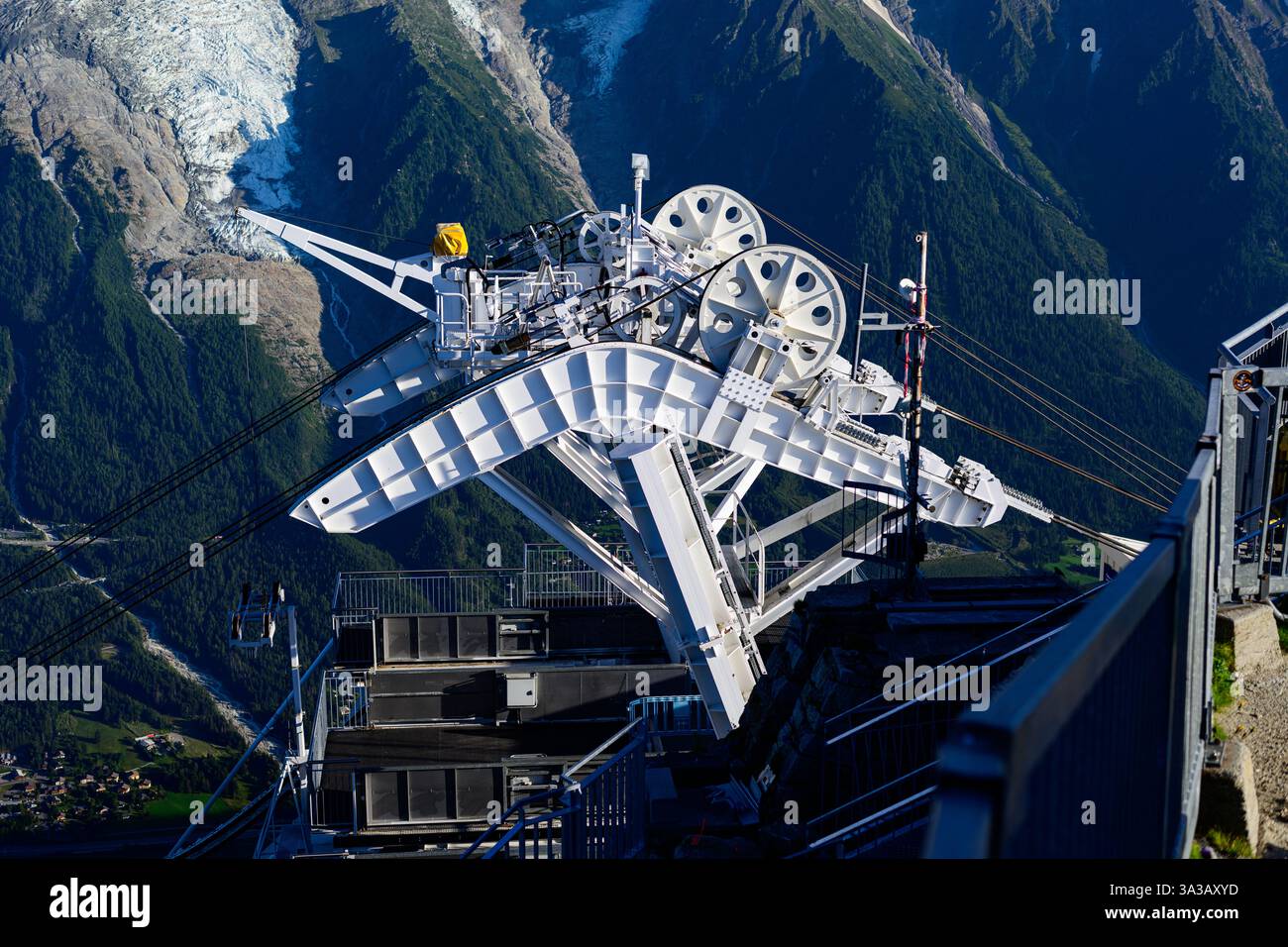 The ski lift motor, typically electric, power the bull-wheels that ...