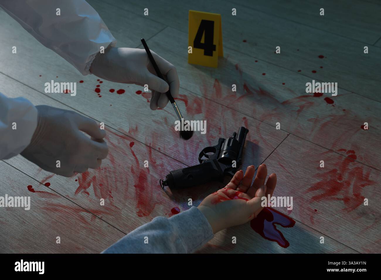 Forensic expert taking fingerprints with brush from gun and dead woman's body at crime scene ...