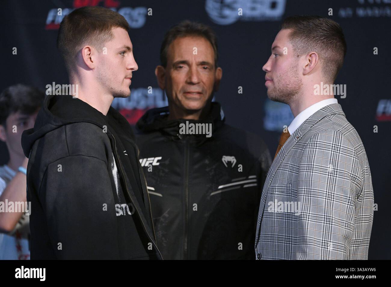 (L-R) Boxing promoter Tom Loeffler stands professional boxers Callum ...