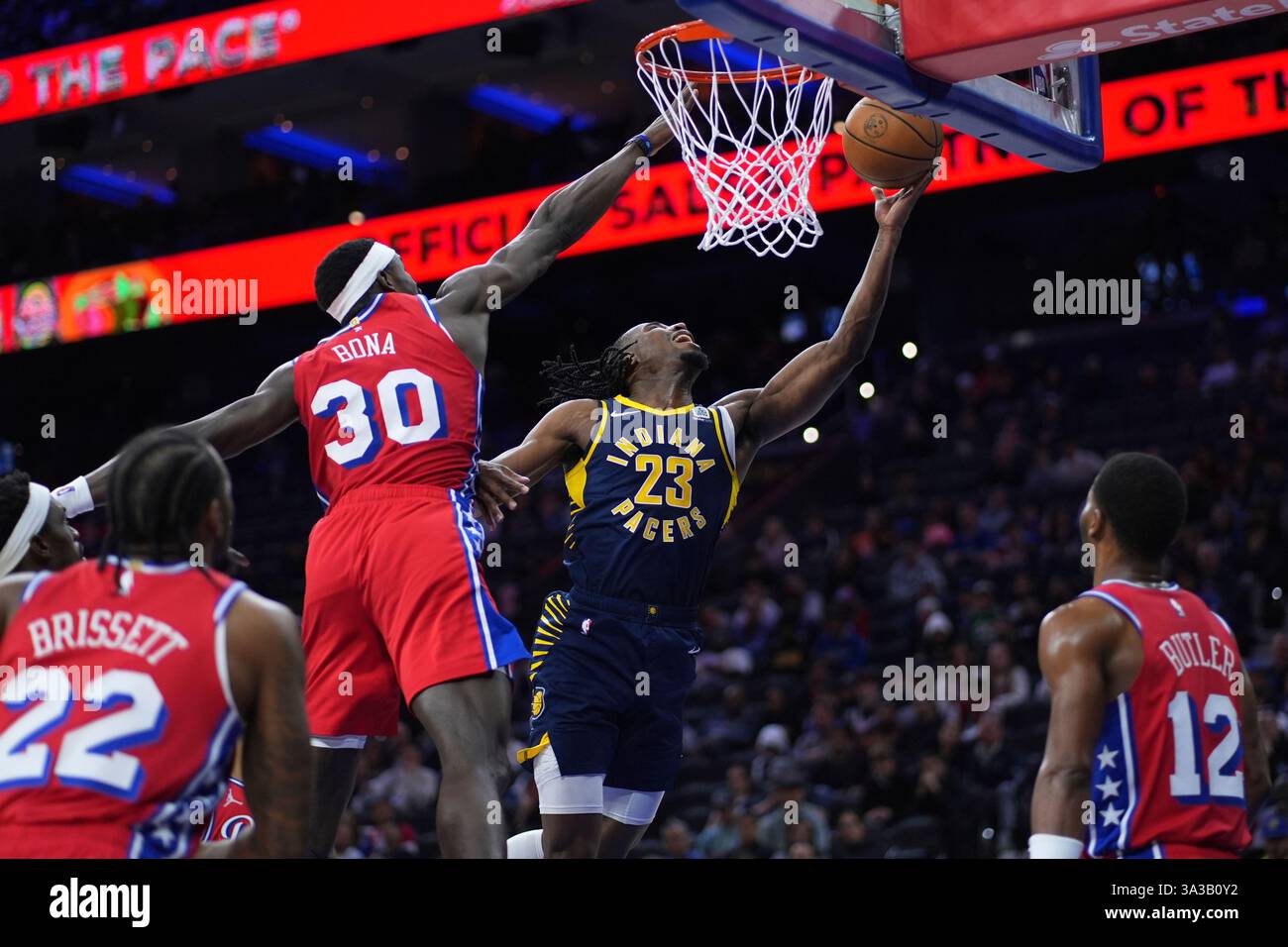Indiana Pacers' Aaron Nesmith (23) goes up for a shot past Philadelphia ...