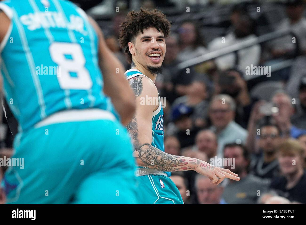 Charlotte Hornets guard LaMelo Ball (1) reacts to a score against the ...