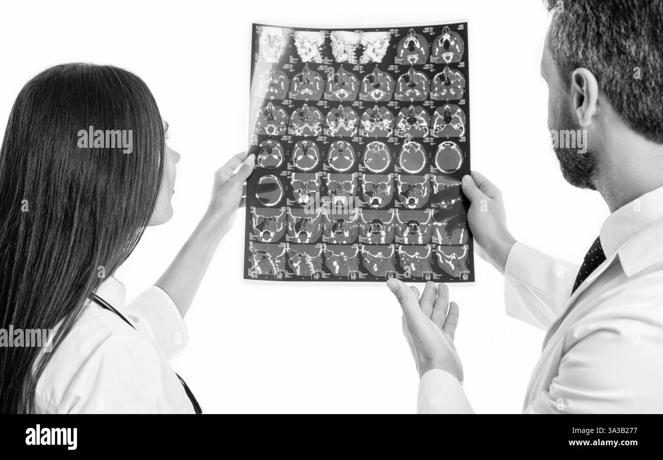 two doctor hold xray making clinical diagnosis. Surgeon showing X-ray ...