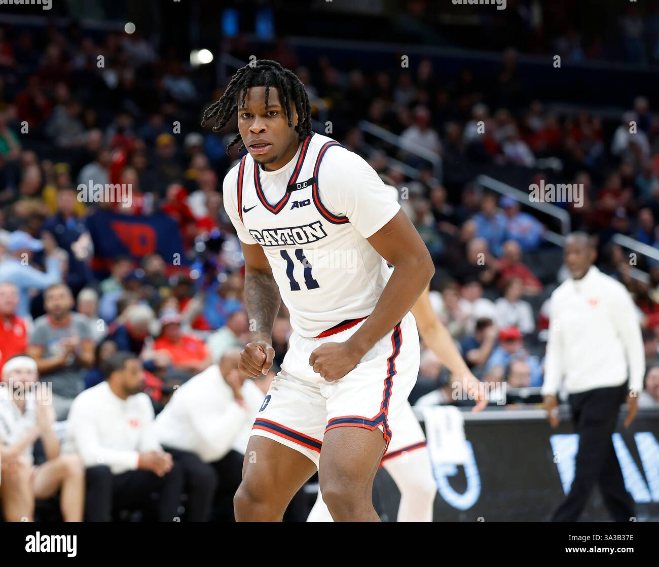 March 14, 2025: Dayton Flyers Guard (11) Malachi Smith celebrates a ...